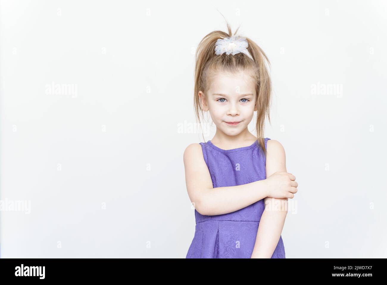 portrait of a cute 5 year old girl on a light background Stock Photo ...
