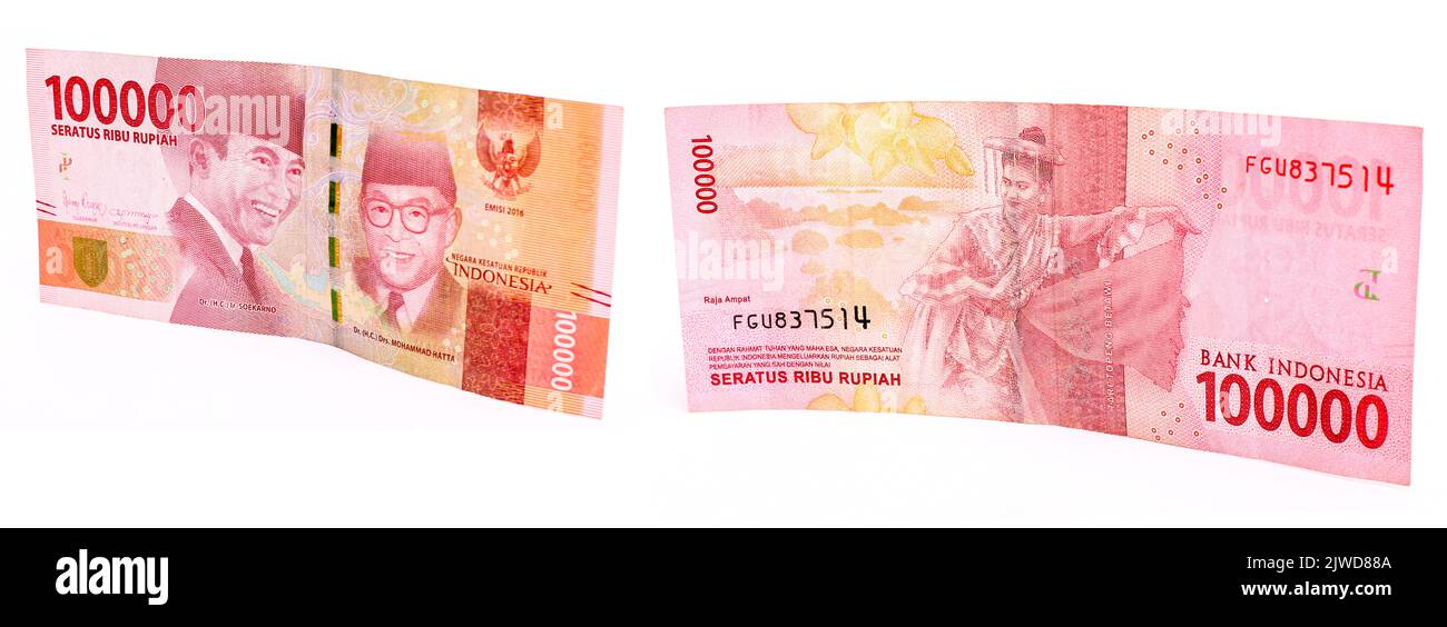 Indonesian rupiah currency isolated on white background Stock Photo - Alamy