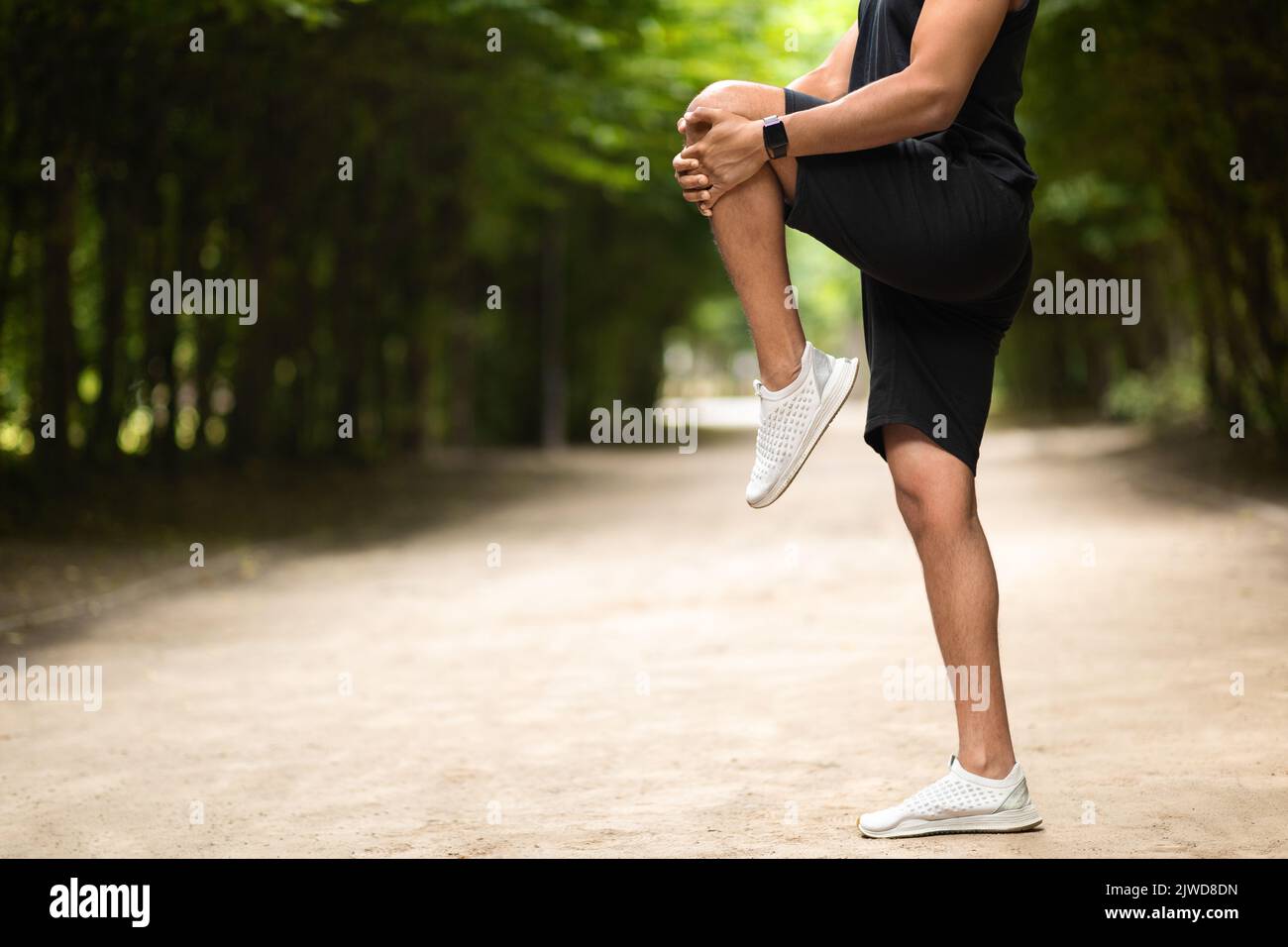 Young african american man stretching outdoor hi-res stock photography ...