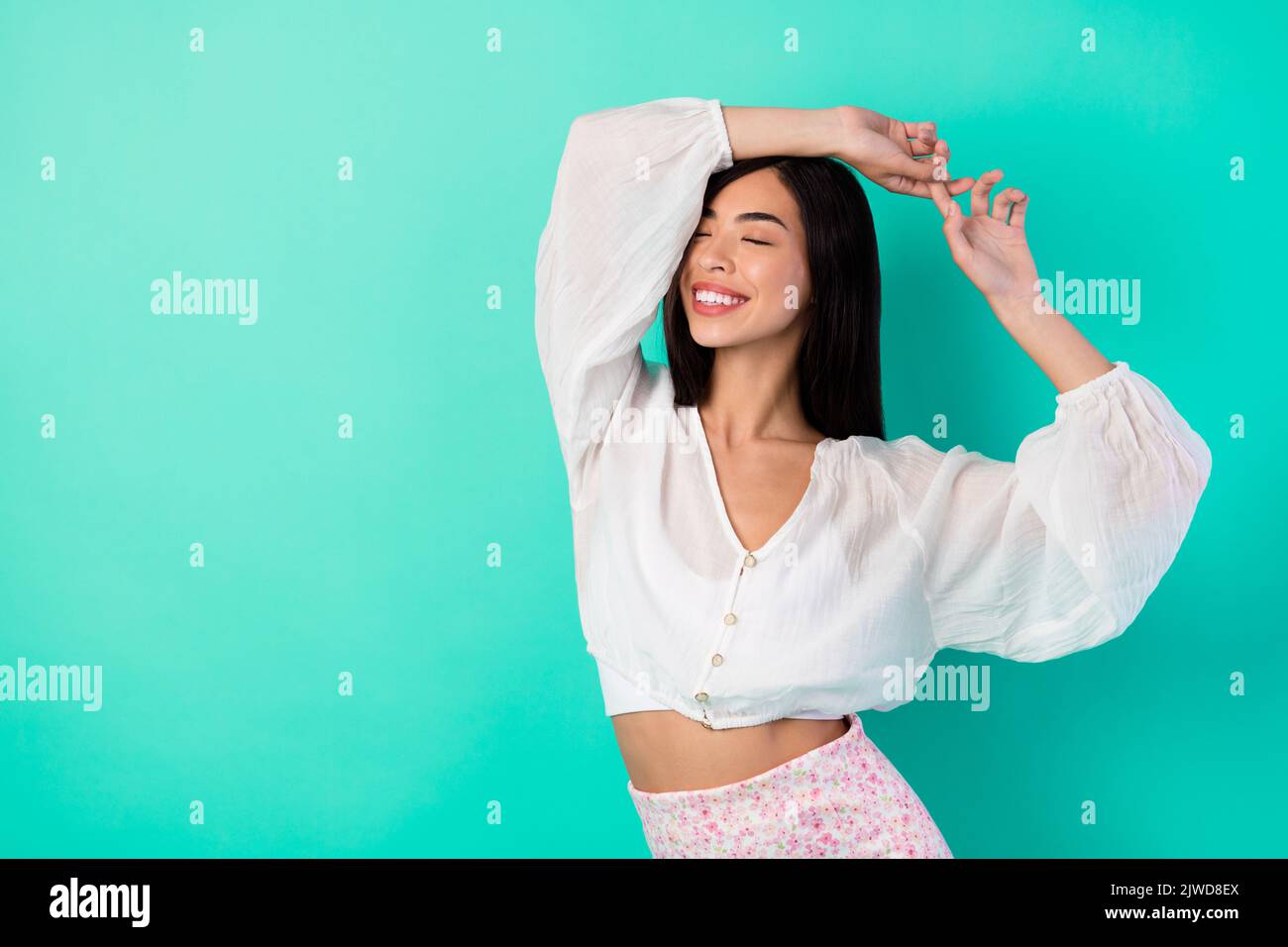 Photo of adorable sweet cute lady raise arms up enjoy armpit smell use ...