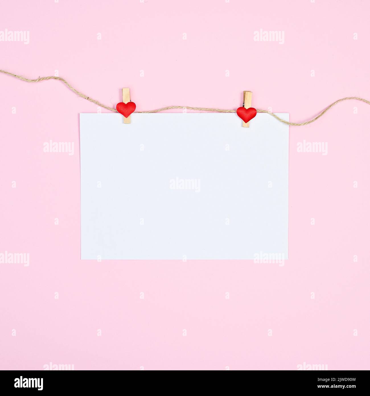 White paper hanged on rope hi-res stock photography and images - Alamy