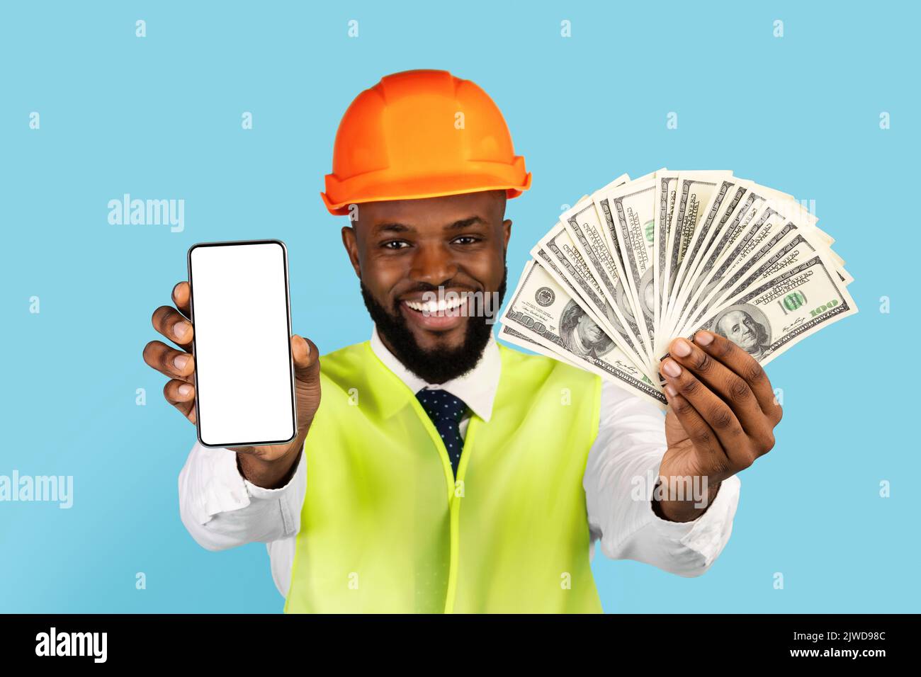 Great Offer. Black Builder Man Demonstrating Money And Blank Smartphone ...