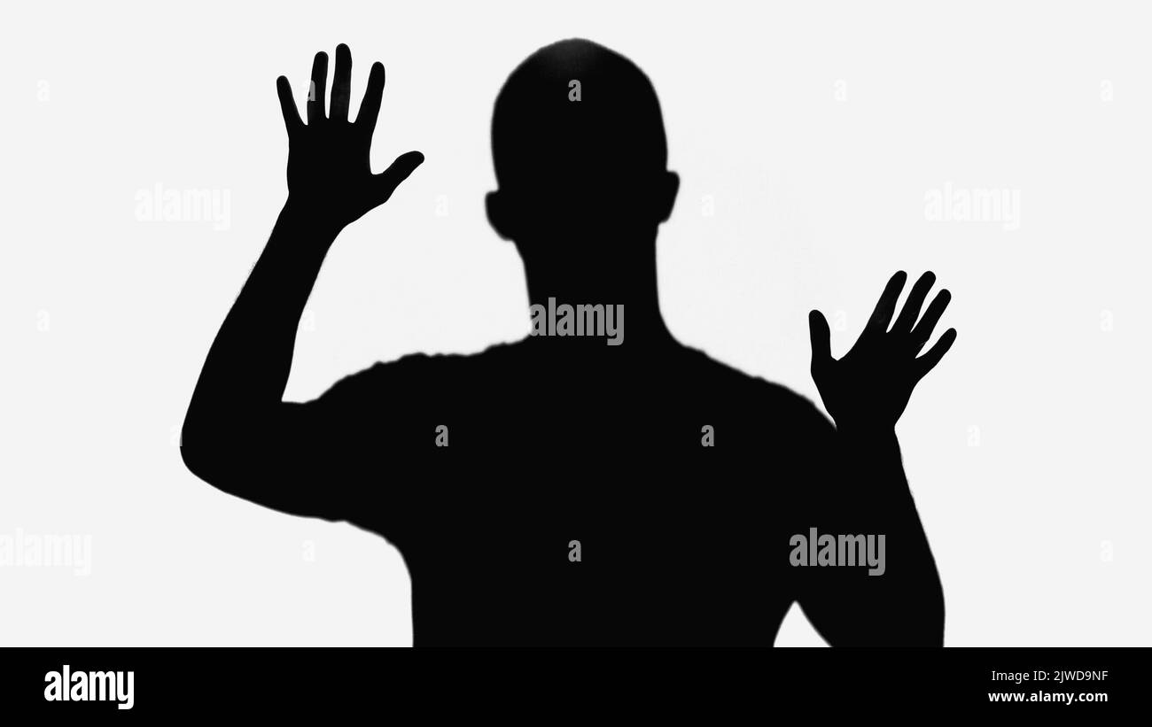 black silhouette of man waving hands isolated on white Stock Photo - Alamy