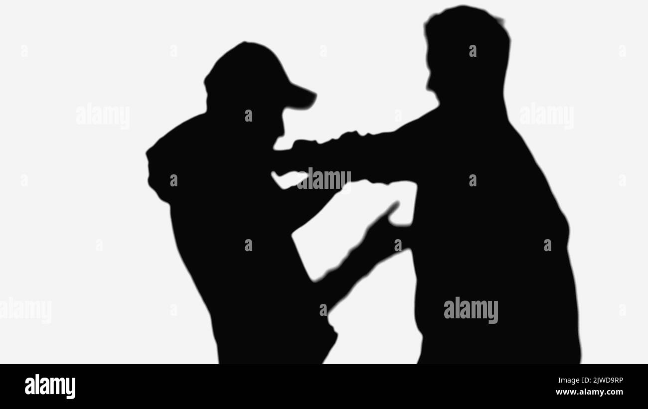 side view of man fighting with robber in cap isolated on white Stock ...