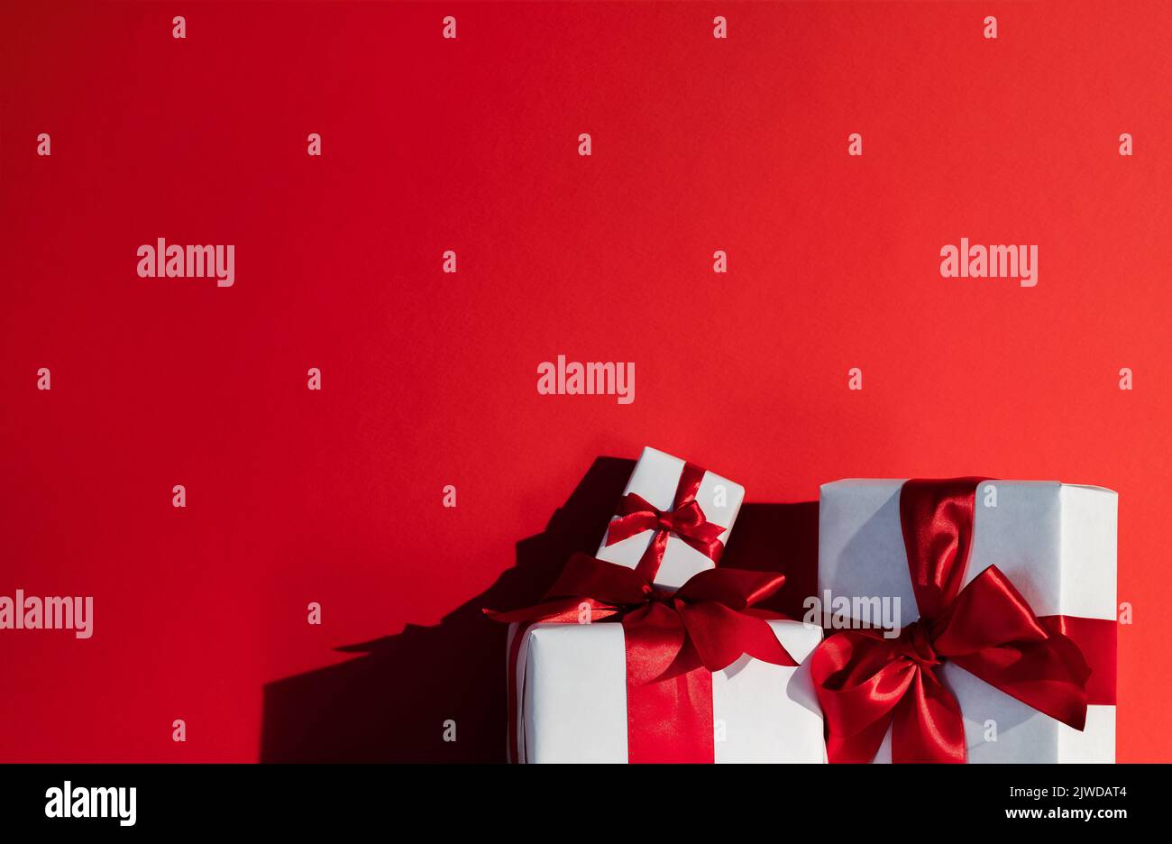 christmas background holiday present boxes red Stock Photo - Alamy