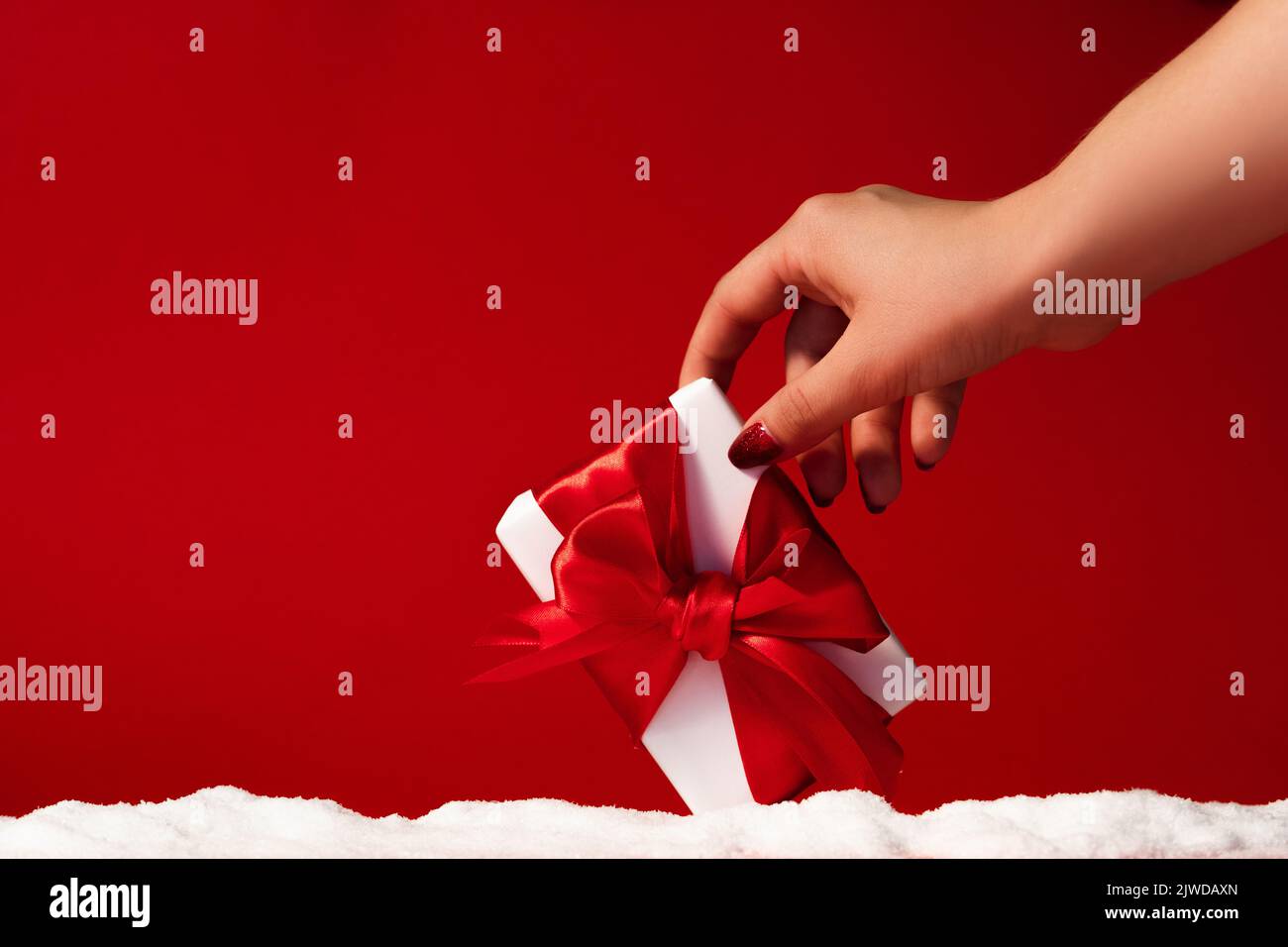 christmas surprise winter holidays present hand Stock Photo - Alamy