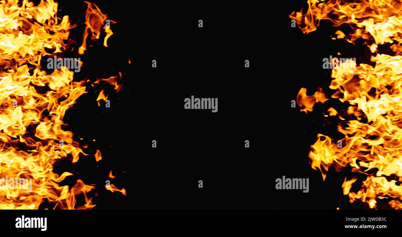 inferno background yellow fire frame on black Stock Photo - Alamy