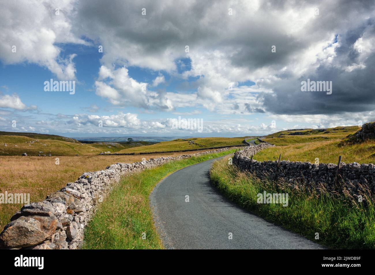 Quiet country lane on Malham Moor, Yorkshire Dales National Park ...