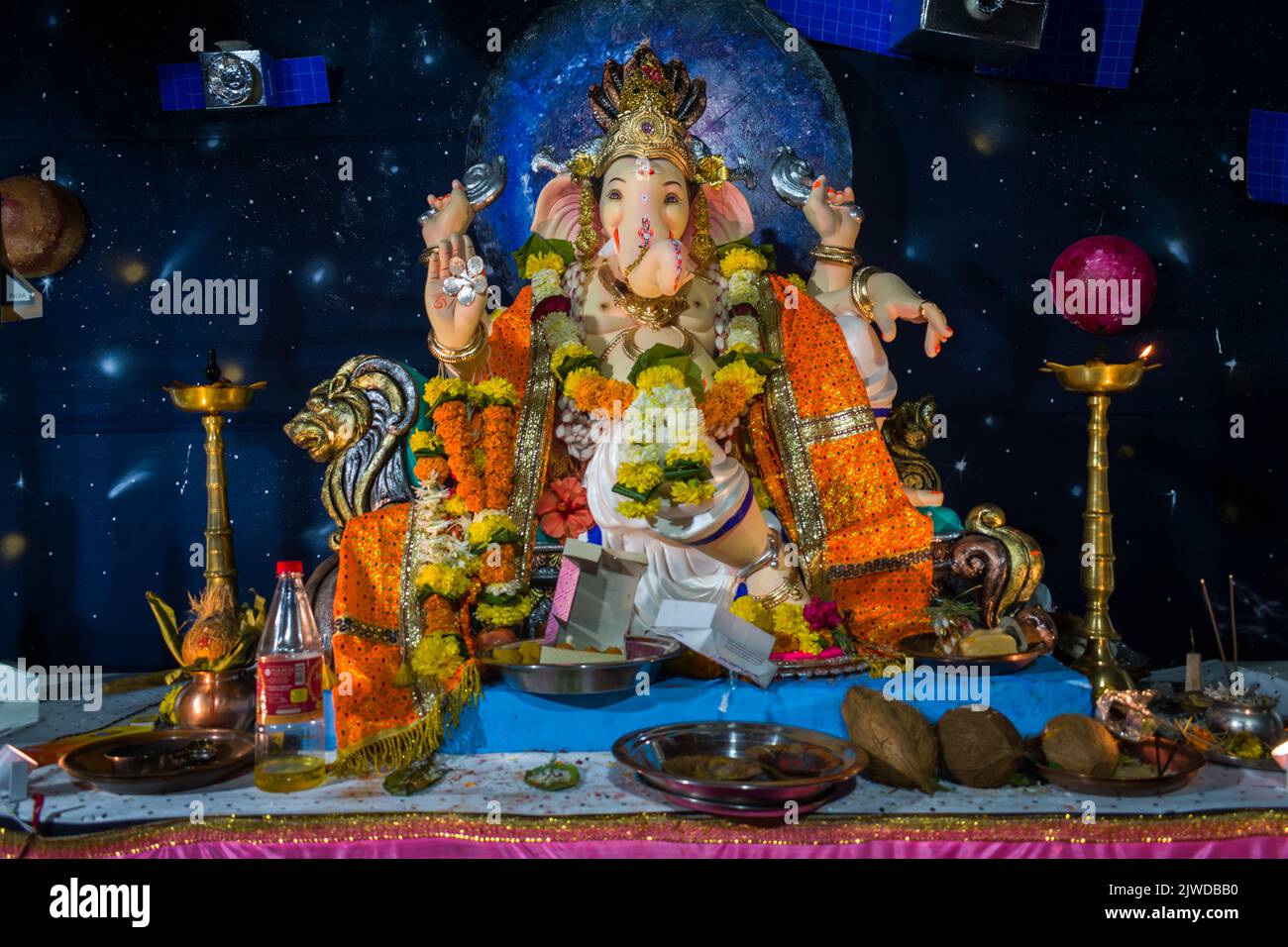 A beautiful idol of Lord Ganesha being worshipped at a mandal in Mumbai ...