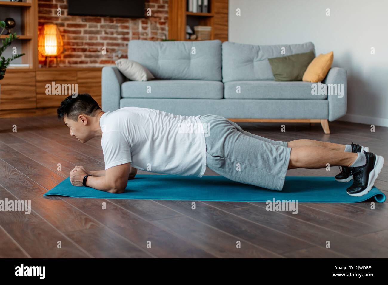 Side plank pose man hi-res stock photography and images - Alamy