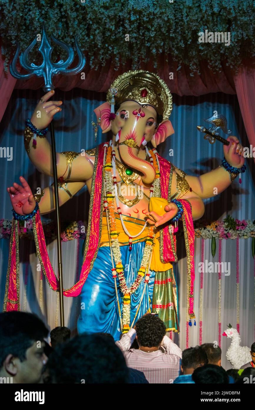 A beautiful idol of Lord Ganesha being worshipped at a mandal in Mumbai ...