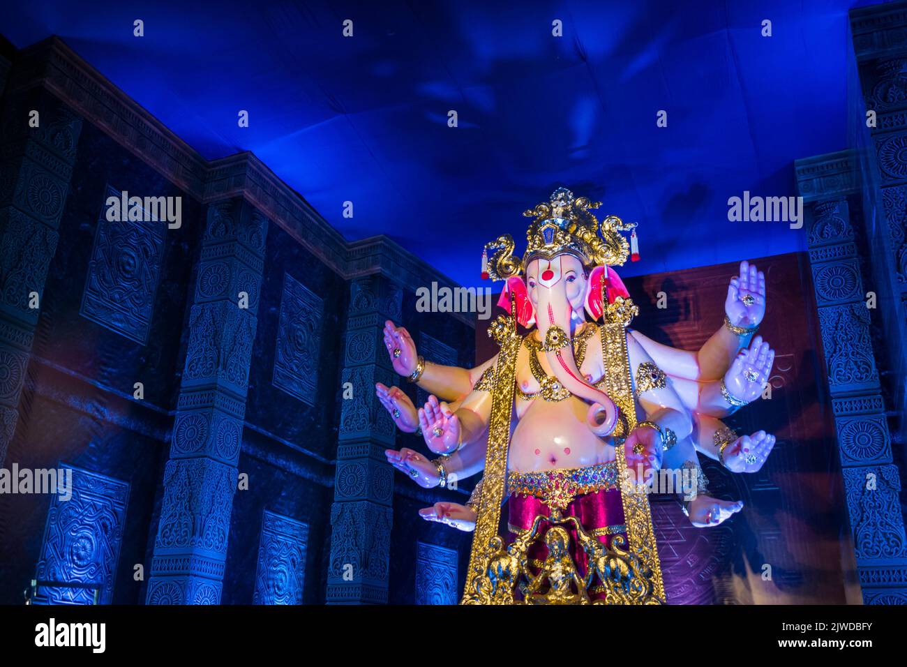 A beautiful idol of Lord Ganesha, Parel cha Raja, being worshipped at a ...