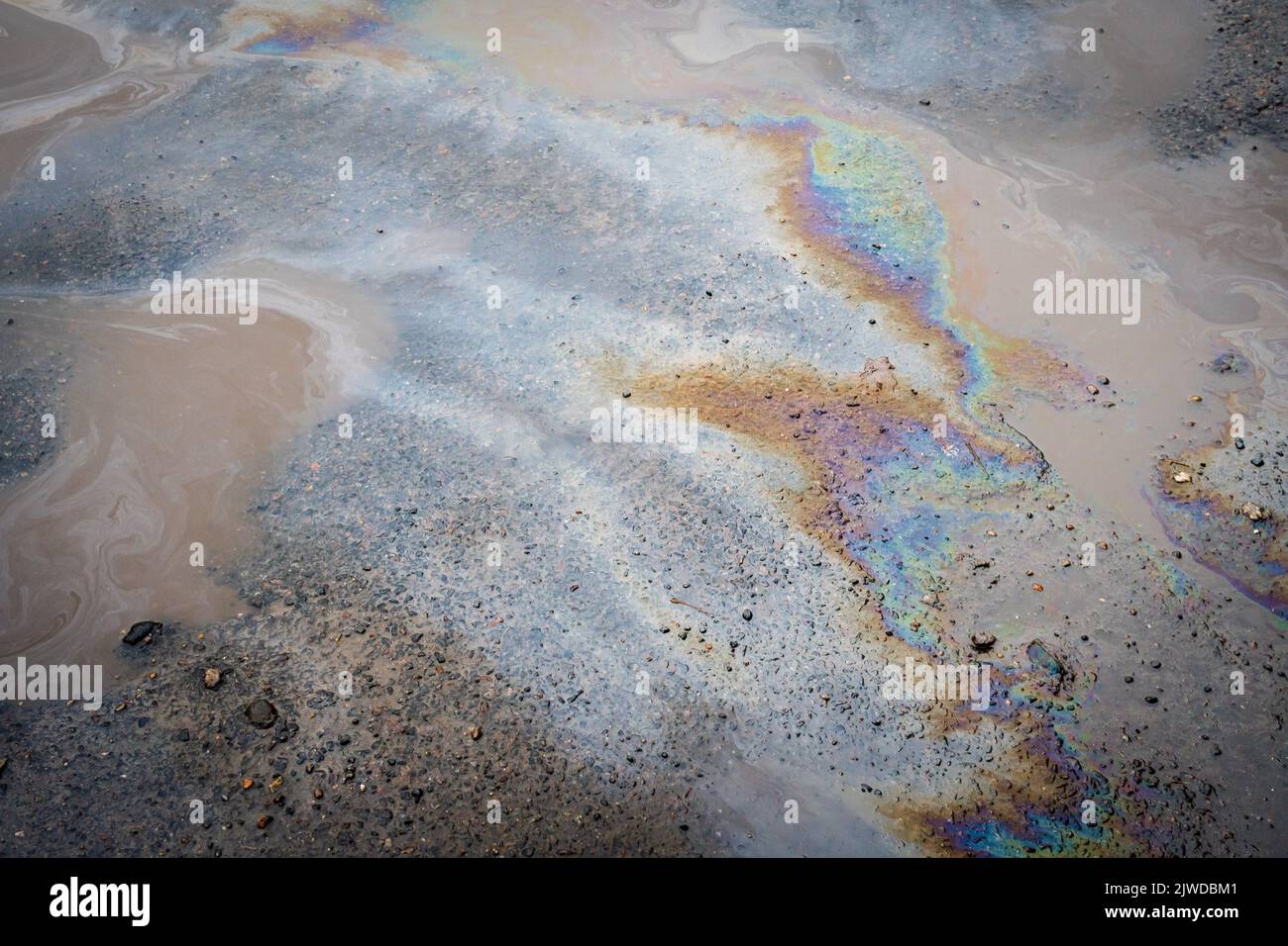Oil rainbow in puddle hi-res stock photography and images - Alamy