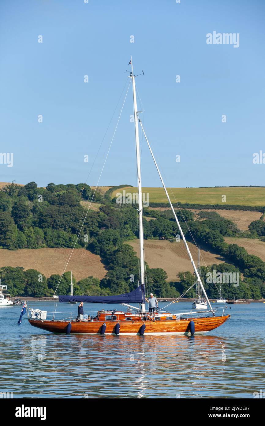 A classic wooden sailboat on the River Dart in Dartmouth Harbour Stock ...