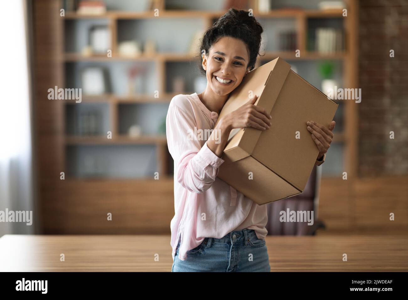 Woman received package hi-res stock photography and images - Alamy