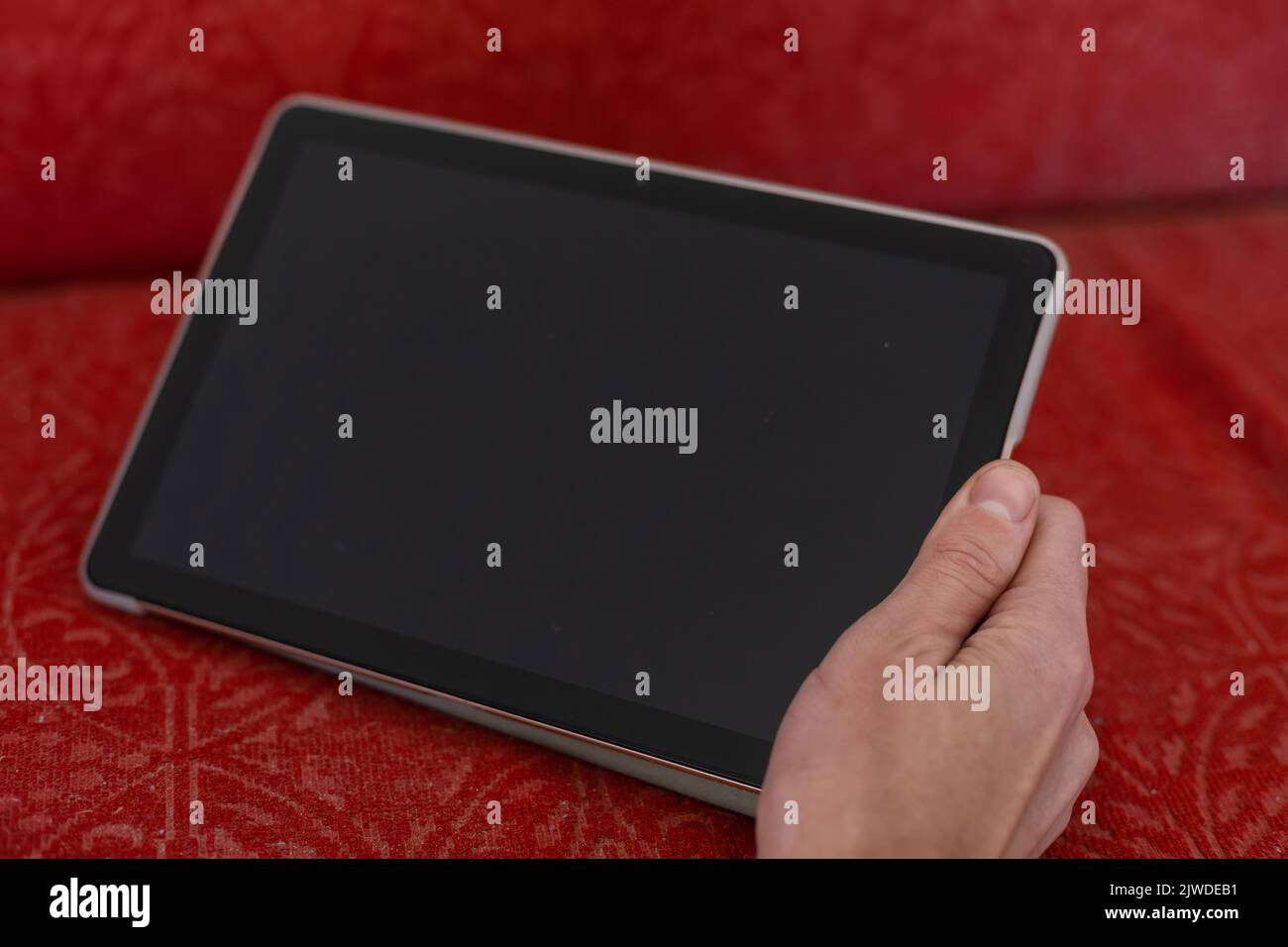 close up hands man using tablet connecting wifi Stock Photo - Alamy