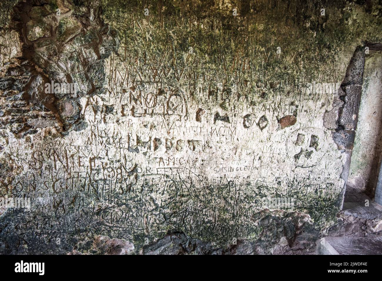 Names & graffiti marked into the stone walls at Blarney Castle and ...