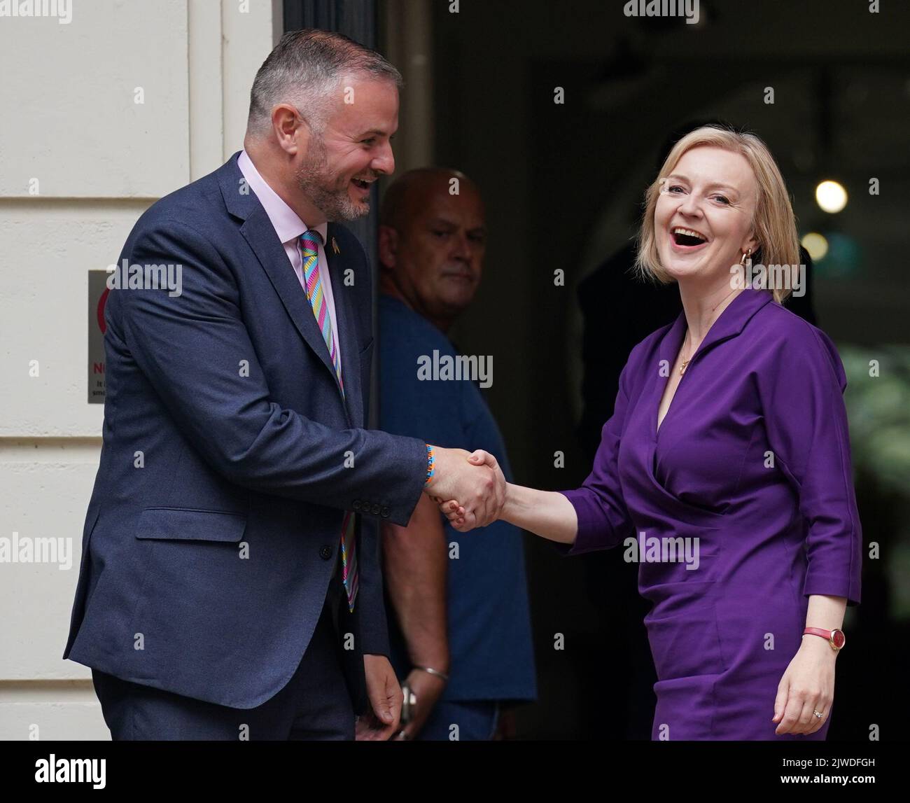 Liz Truss Shakes Hands With Conservative Party Chairman Andy Stephenson