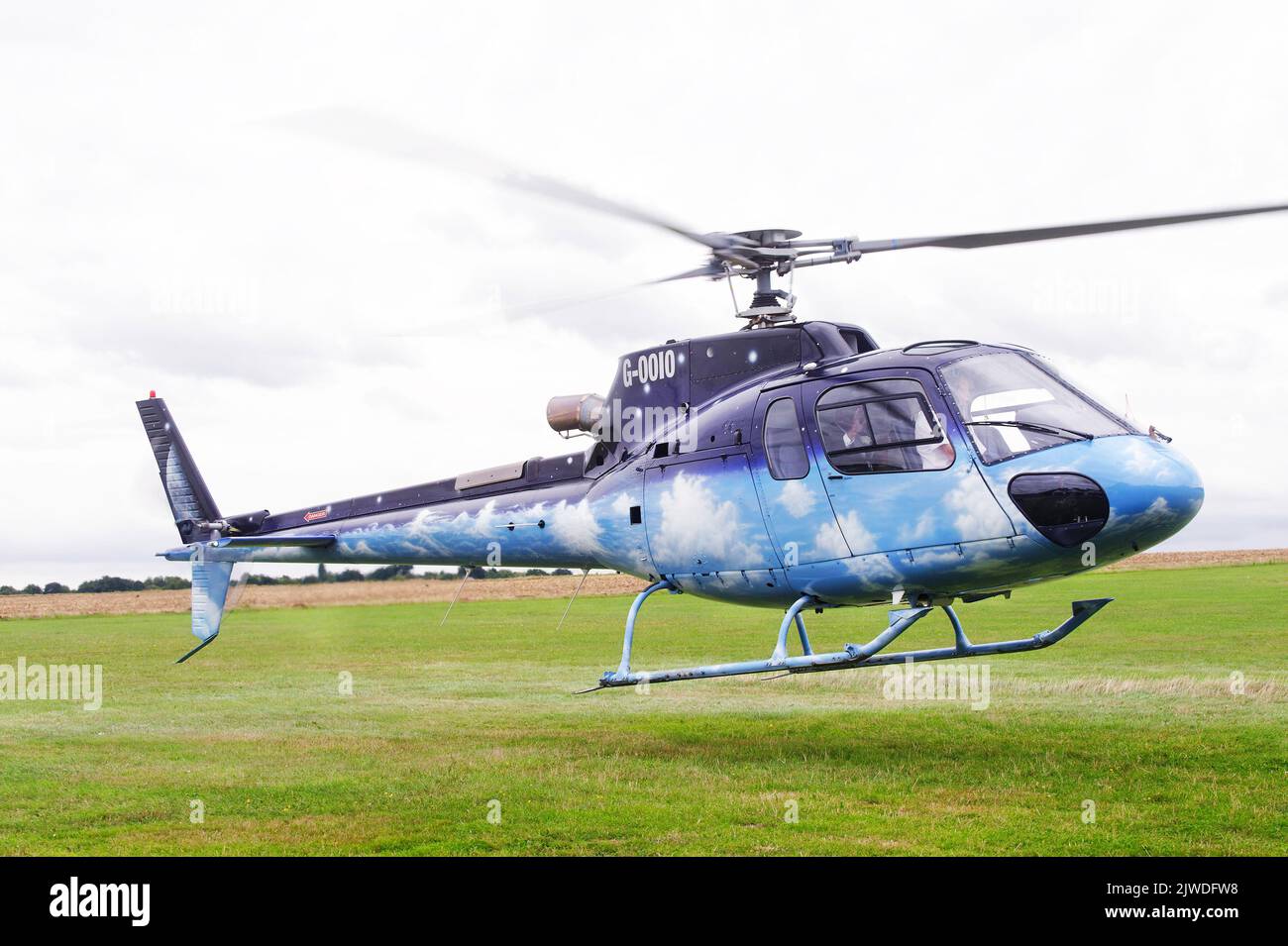 Helicopter in flight Stock Photo - Alamy