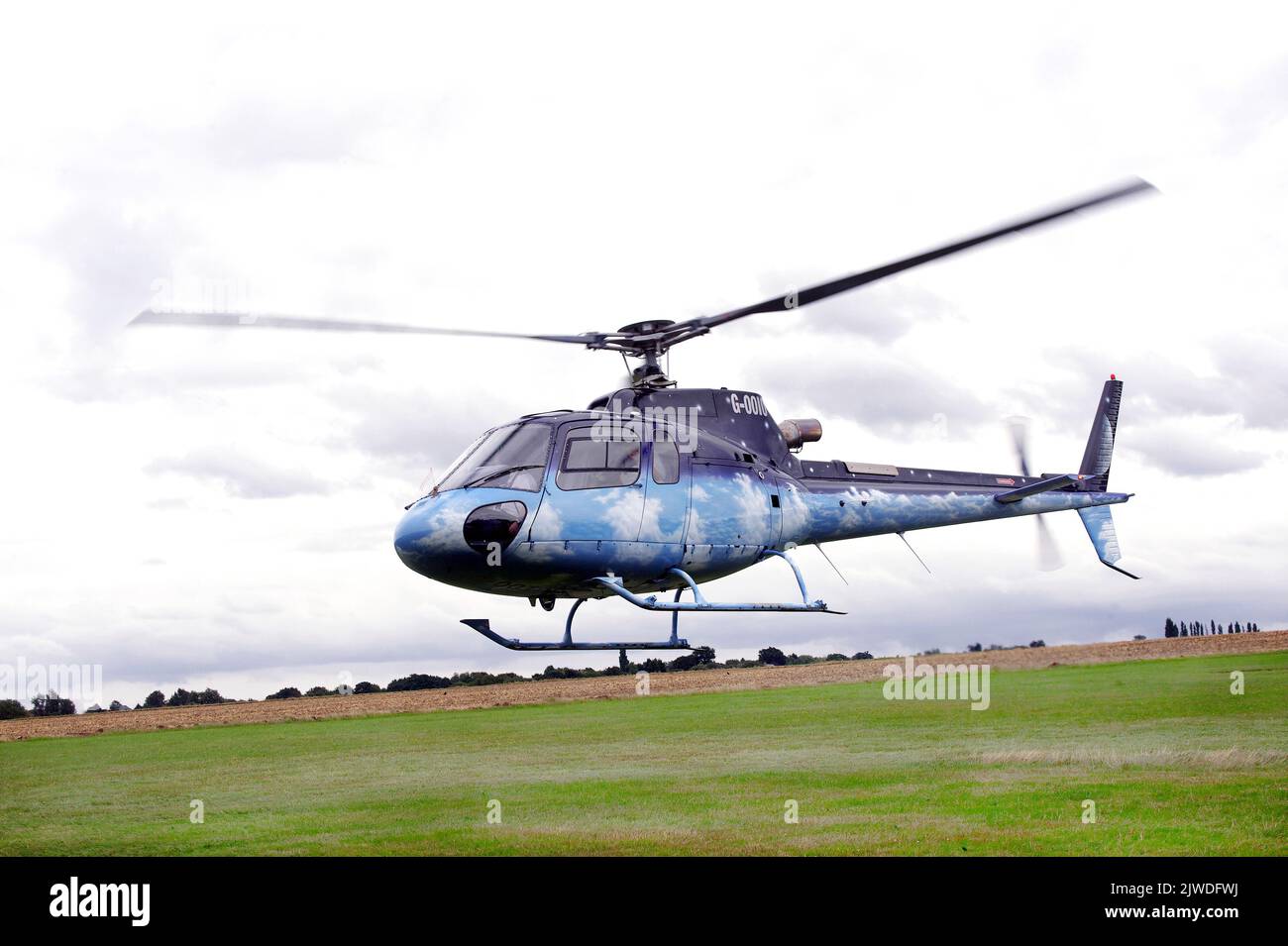 Helicopter in flight Stock Photo - Alamy
