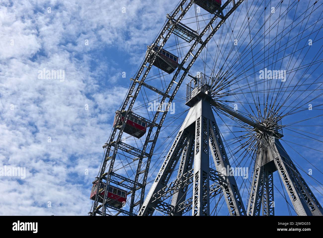 Ferris wheel with blue sky in the big amusement park "Prater" in Vienna ...