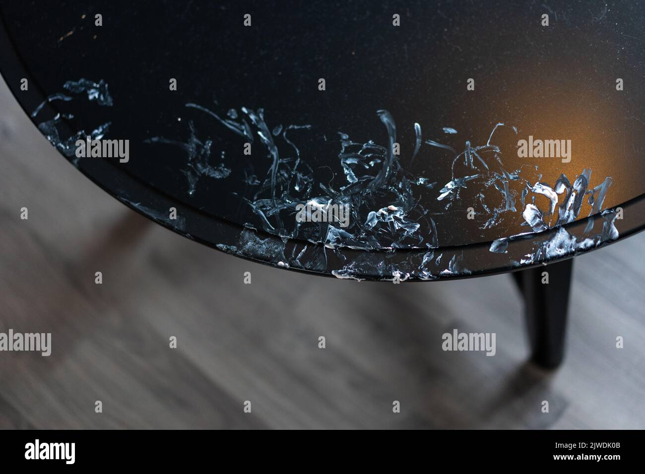 A top view of a dirty black table in the house Stock Photo - Alamy