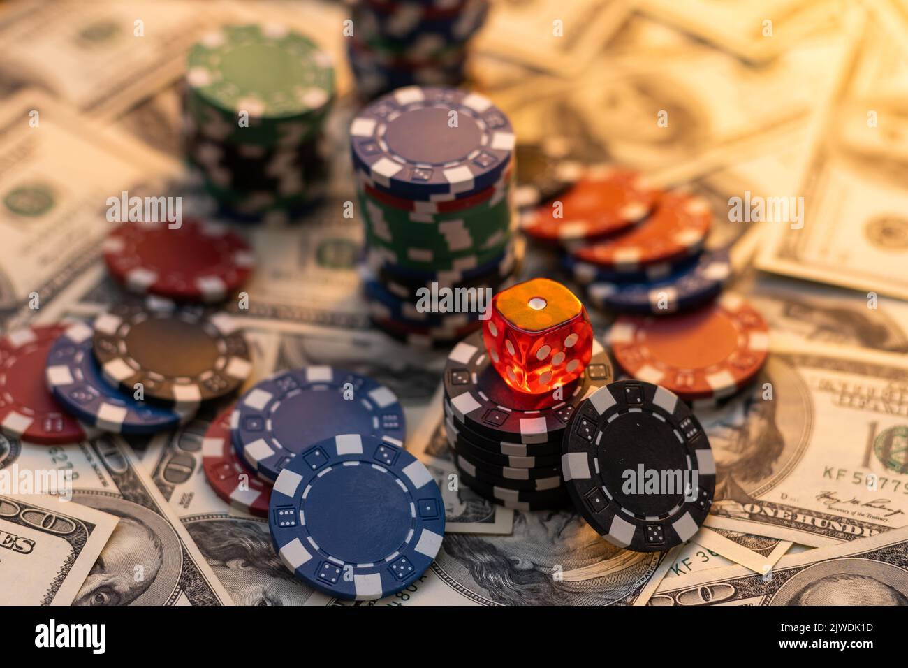poker chips and money, dollars Stock Photo - Alamy