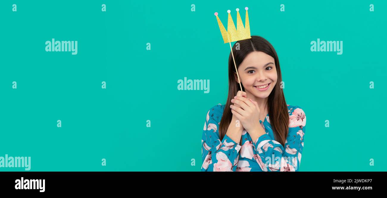 Happy girl princess smile holding prop crown blue background, prom ...