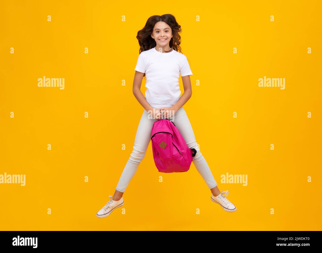 Schoolgirl in school uniform with backpack. Teenage girl student on ...