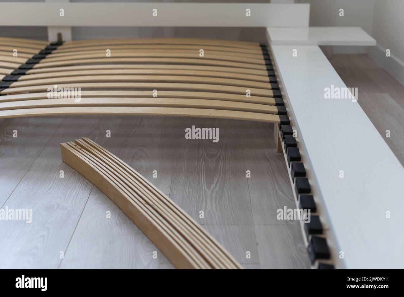 Disassembled sleeping bed. Renovation work in the room Stock Photo - Alamy