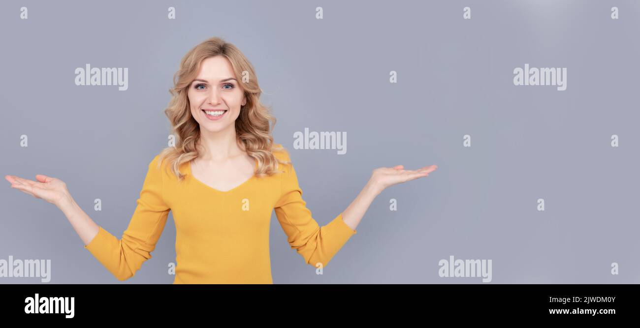 Woman isolated face portrait, banner with mock up copy space. blonde woman presenting product ...