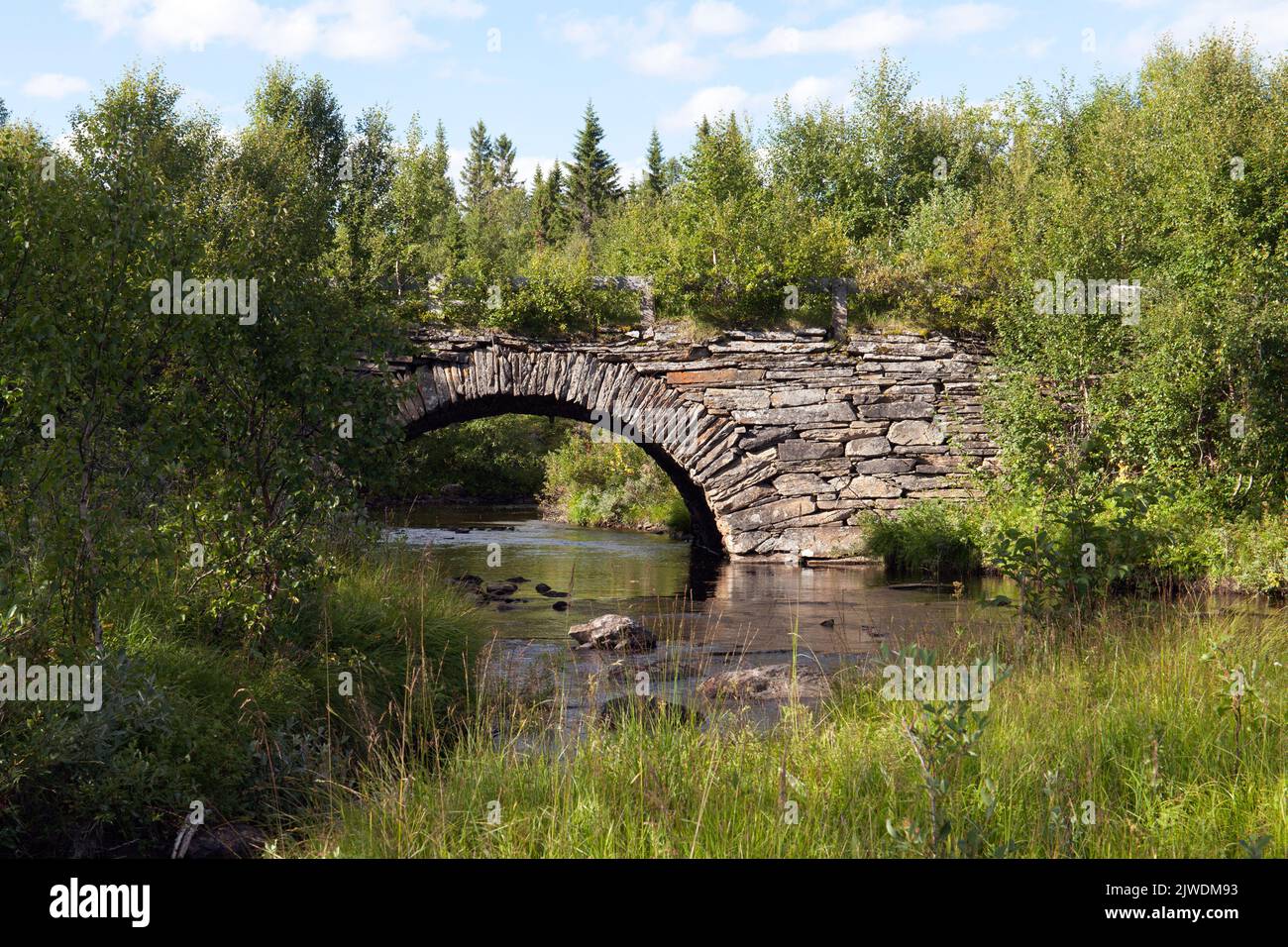 Stone arch bridge on the Pilgrim´s trail St. Olavsleden between Duved ...