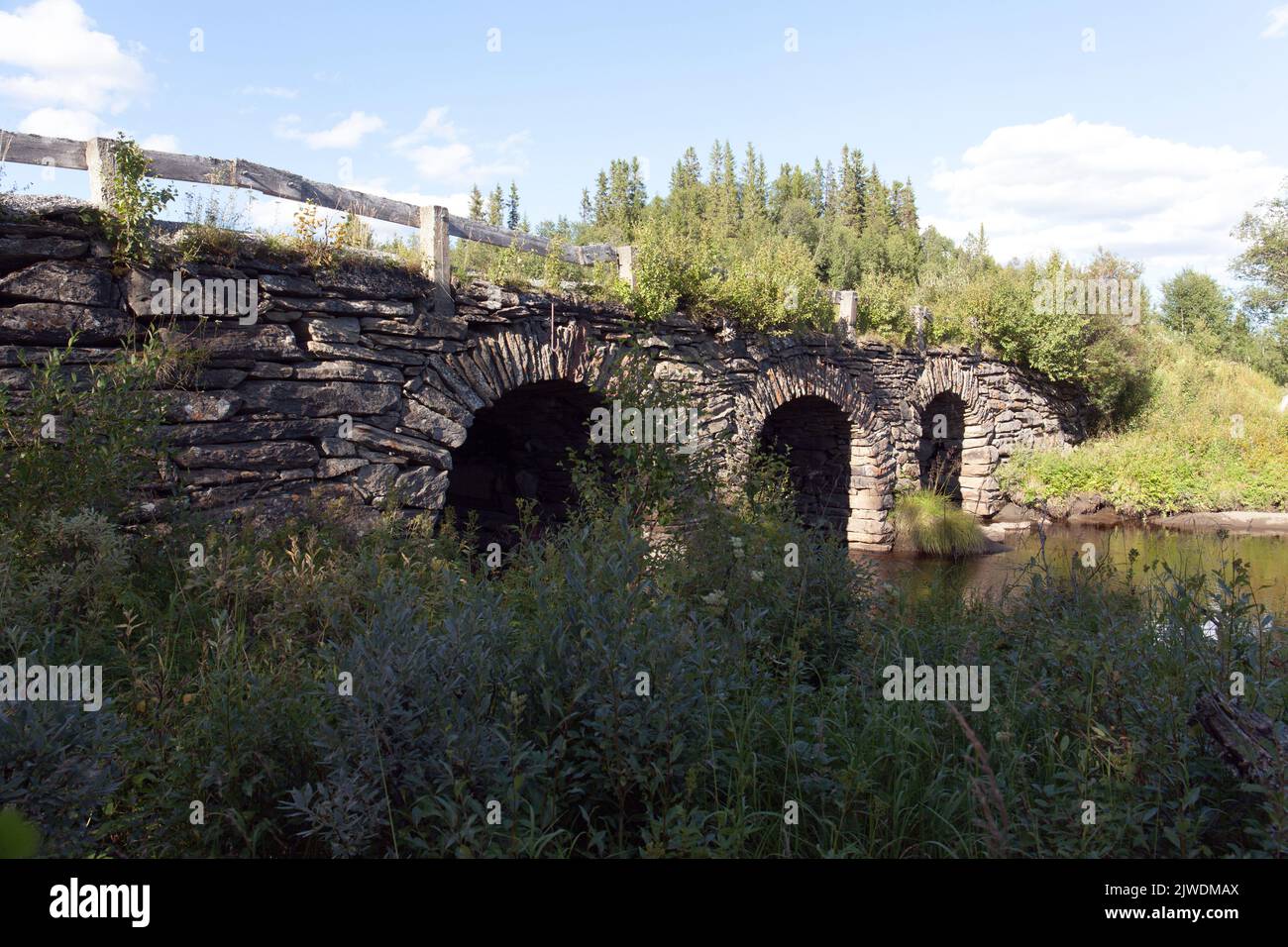Stone arch bridge on the Pilgrim´s trail St. Olavsleden between Duved ...