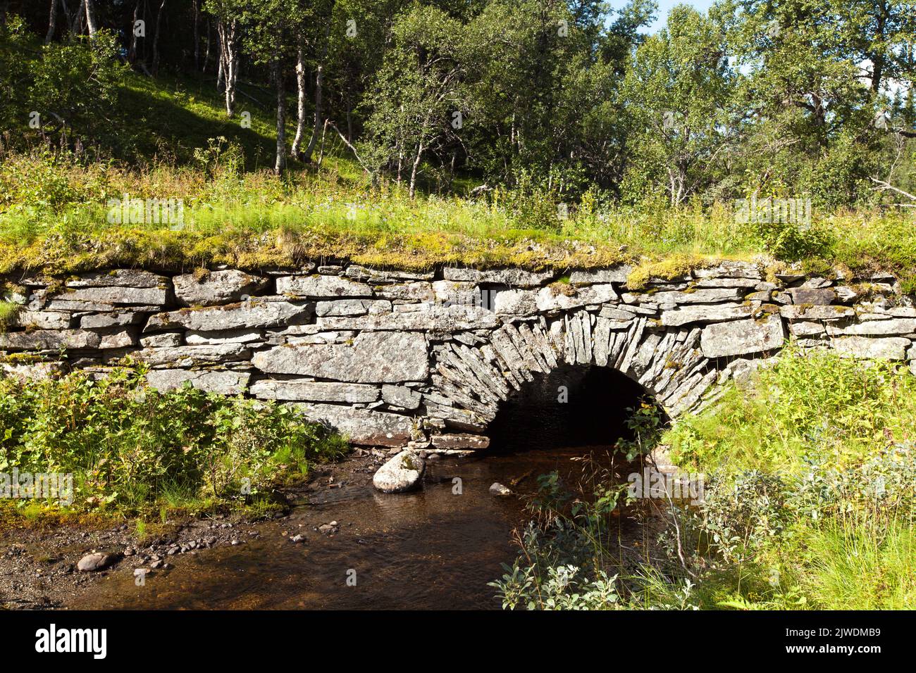 Stone arch bridge on the Pilgrim´s trail St. Olavsleden between Duved ...