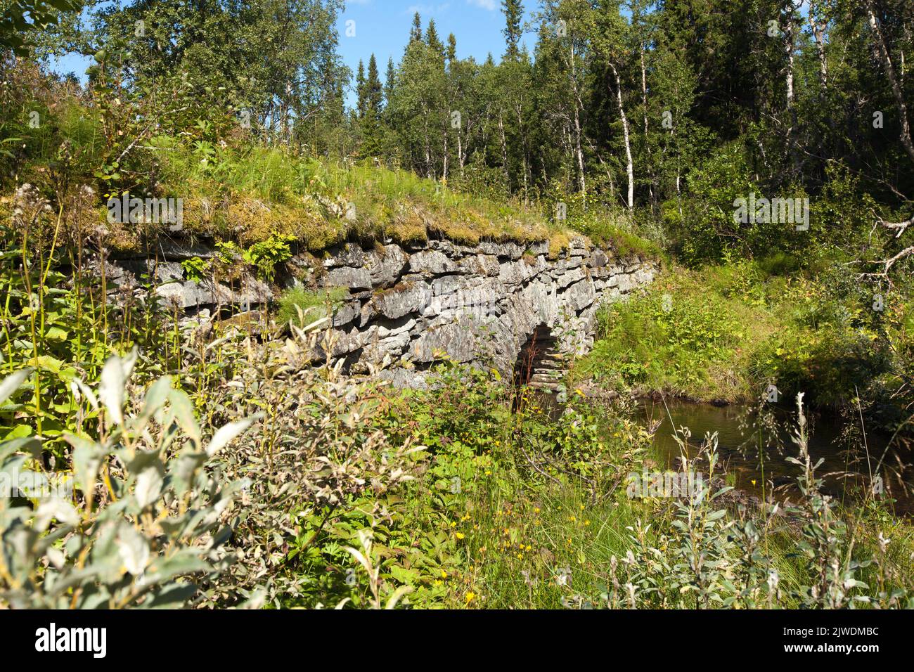 Stone arch bridge on the Pilgrim´s trail St. Olavsleden between Duved ...