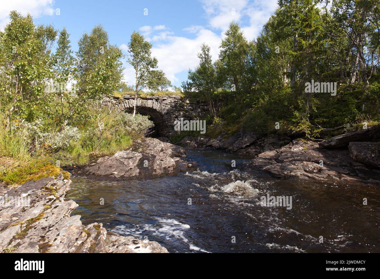 Stone arch bridge on the Pilgrim´s trail St. Olavsleden between Duved ...