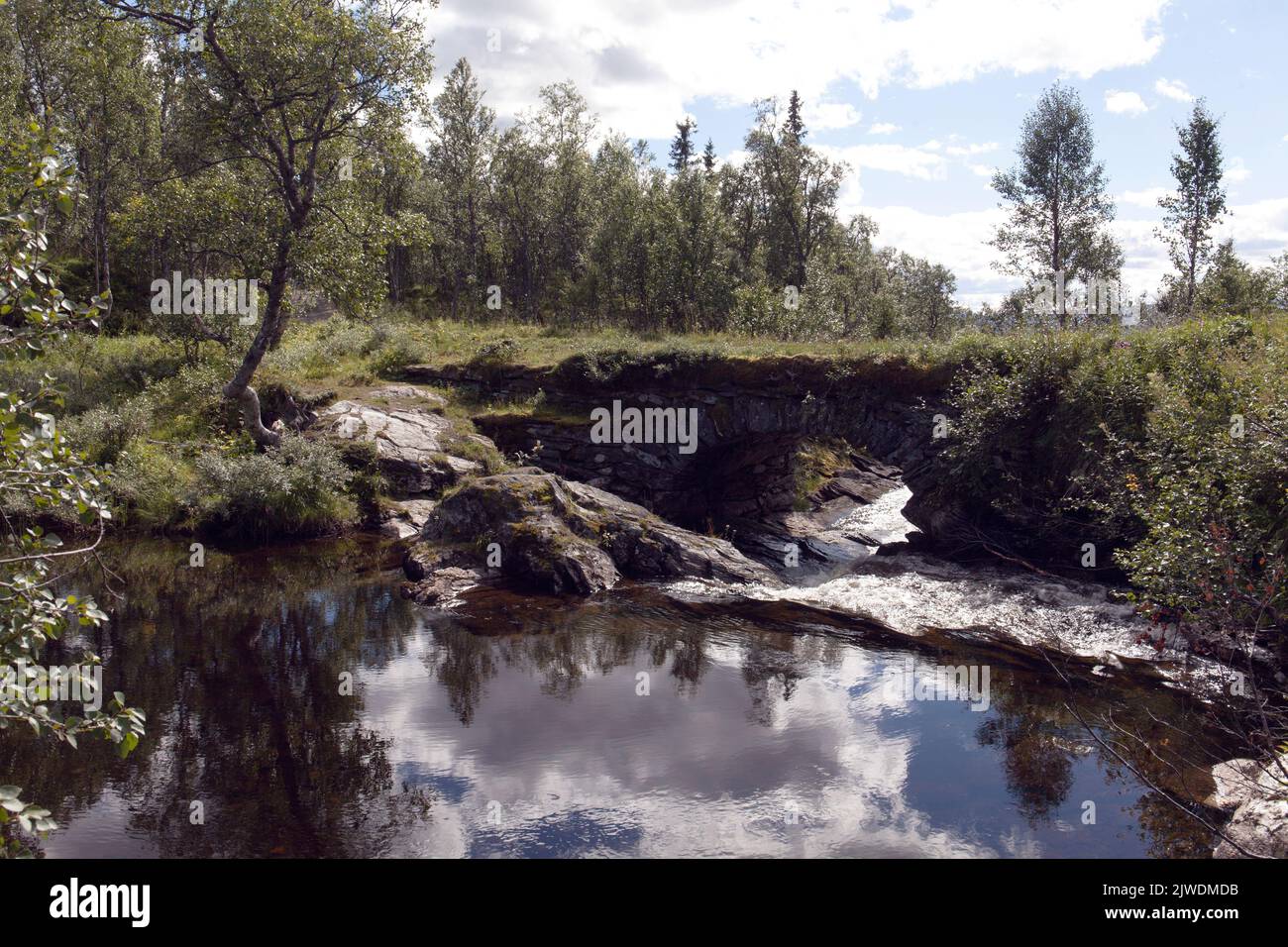 Stone arch bridge on the Pilgrim´s trail St. Olavsleden between Duved ...