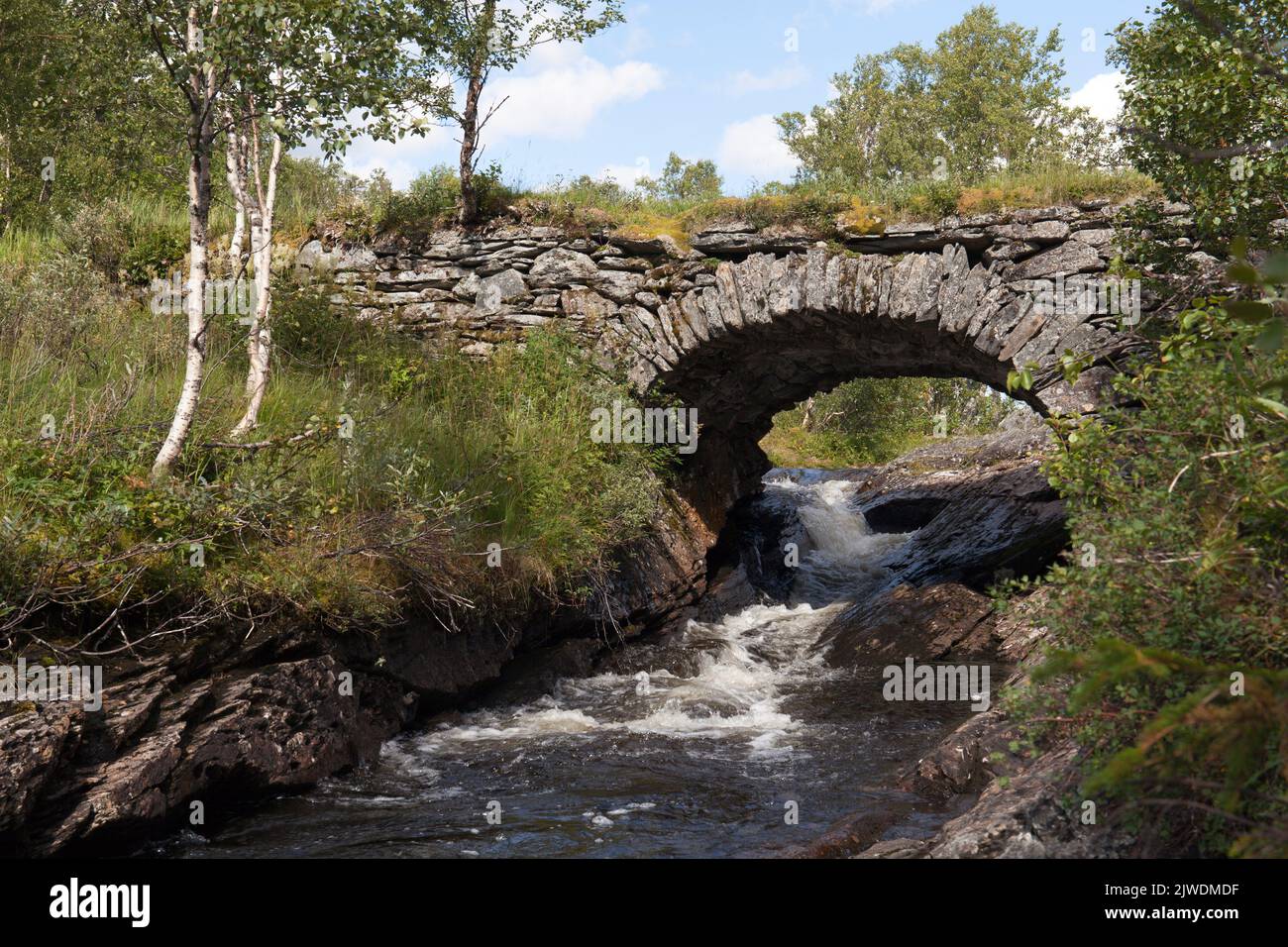 Stone arch bridge on the Pilgrim´s trail St. Olavsleden between Duved ...