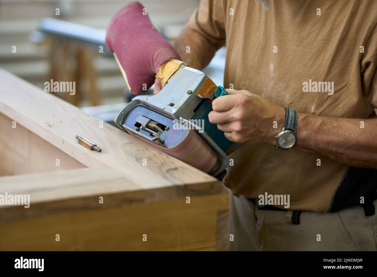 Antique Carpenter Works On A Cabinet With A Grinding Machine. Russikon ...