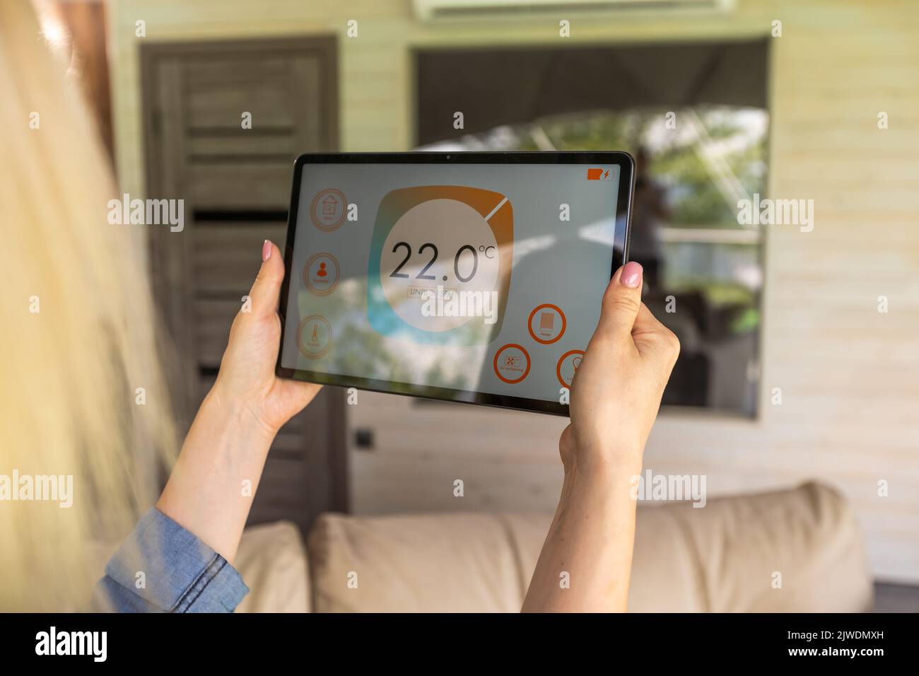 Modern home smart automation app on tablet display in woman hands Stock ...