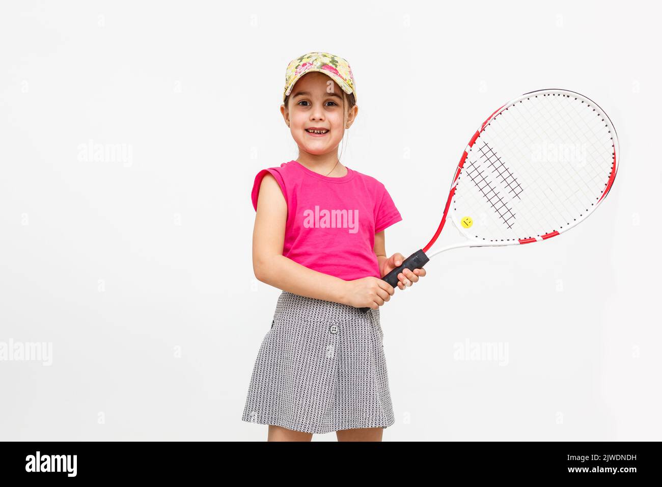 little girl with a tennis racket Stock Photo - Alamy