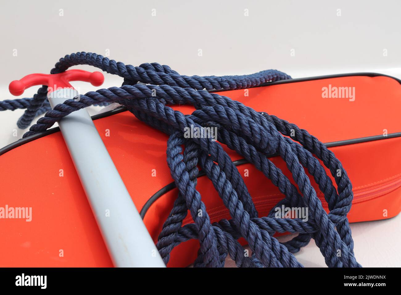 A blue rope and float on boat with paddle Stock Photo - Alamy