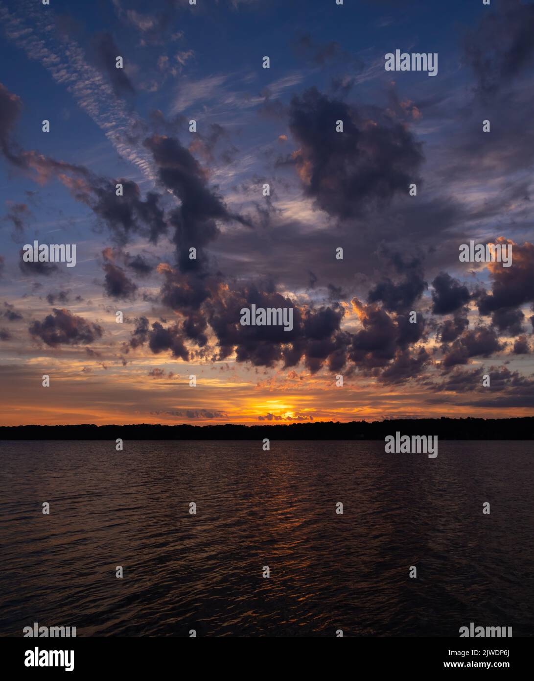 dawn over lake panorama with vivid colors Stock Photo - Alamy