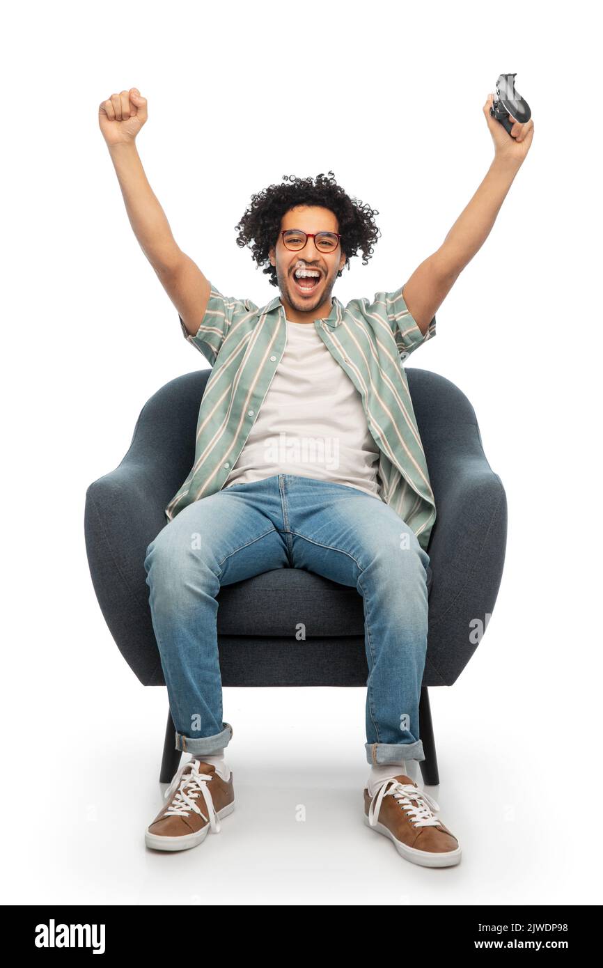 Young man playing online Cut Out Stock Images & Pictures - Alamy