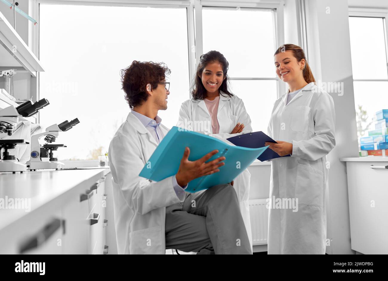 international group of scientists in laboratory Stock Photo - Alamy