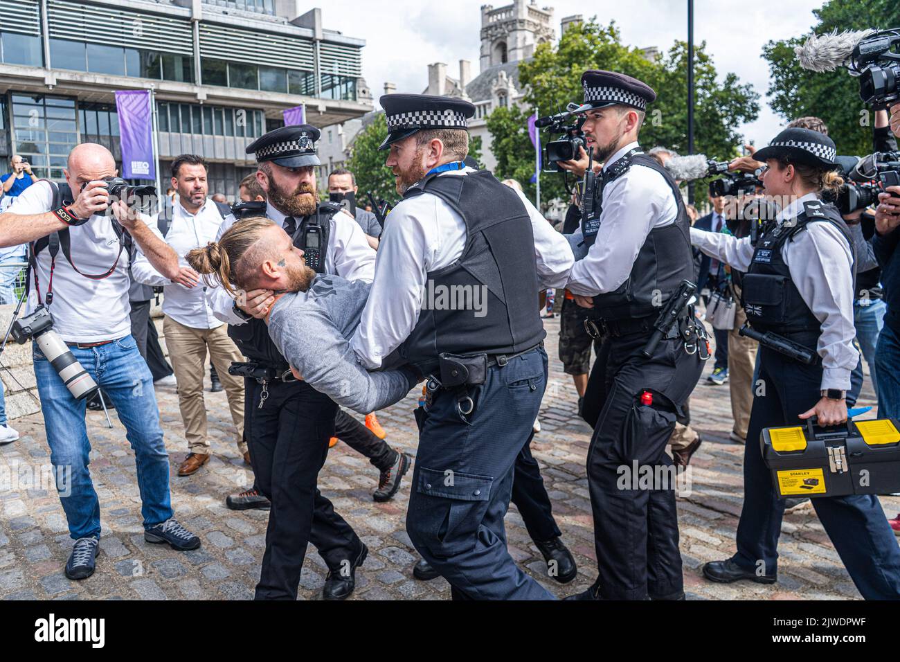 London UK. 5 September 2022. An animal rebellion protester is carried ...