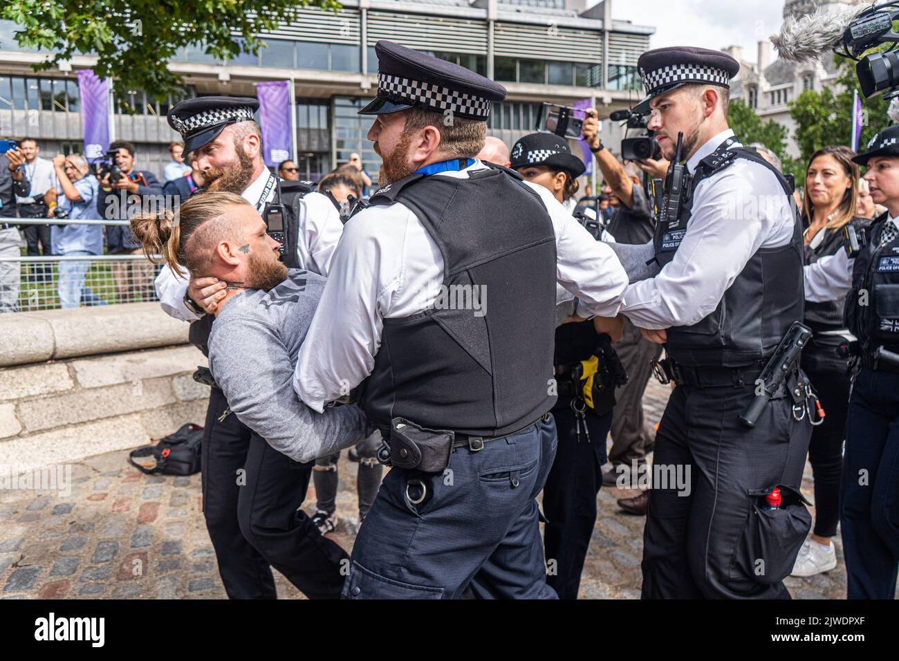 London UK. 5 September 2022. An animal rebellion protester is carried ...