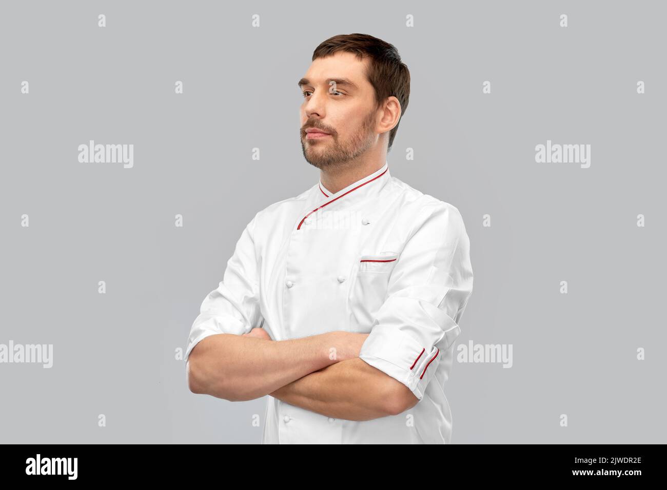 Serious male cook arms crossed hi-res stock photography and images - Alamy