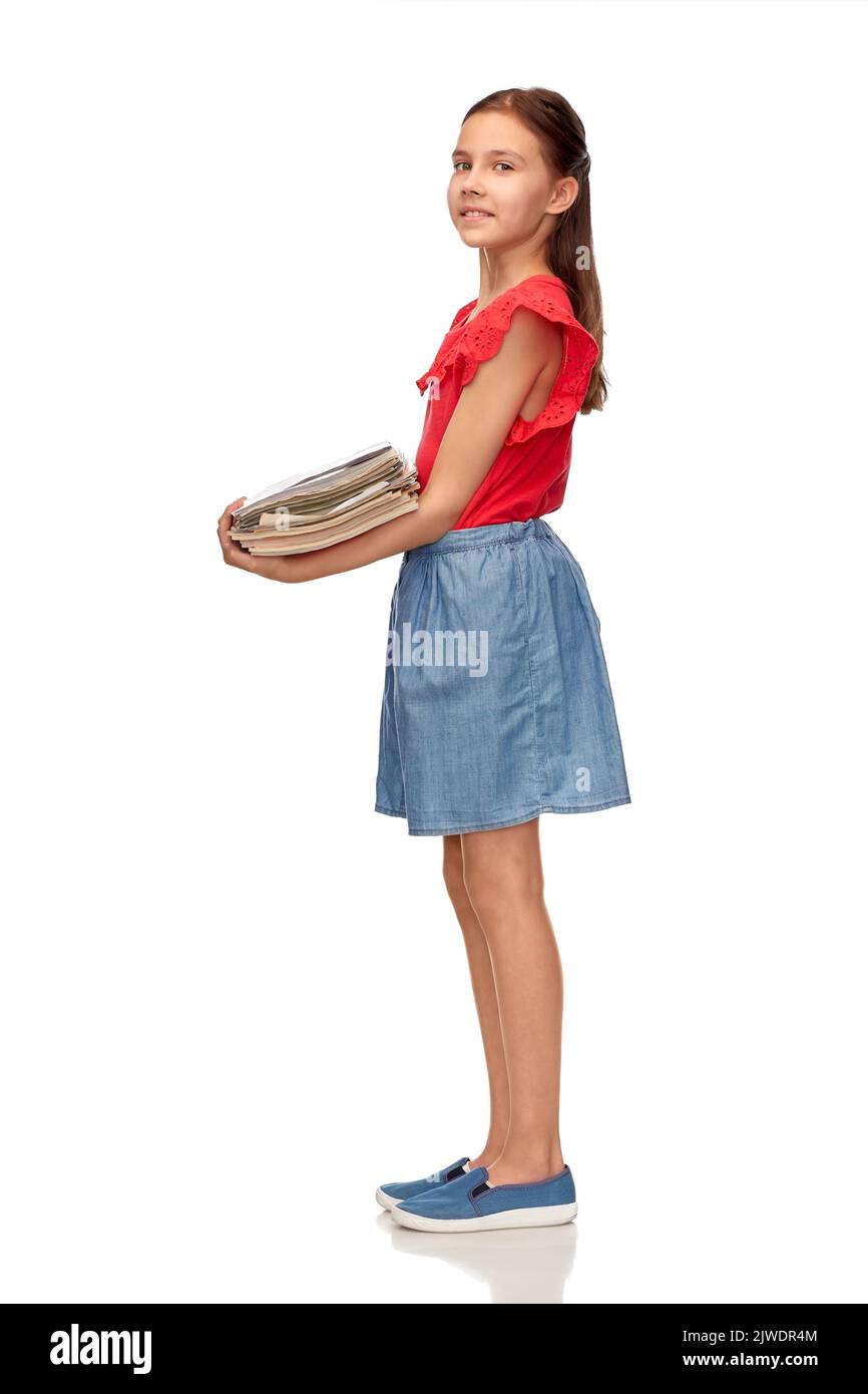 smiling girl with magazines sorting paper waste Stock Photo - Alamy
