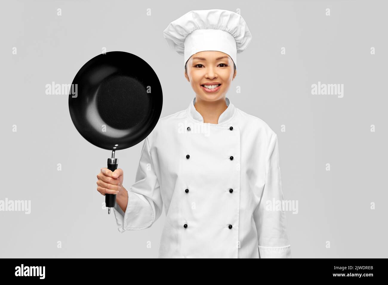 Happy asian chef wok hi-res stock photography and images - Alamy